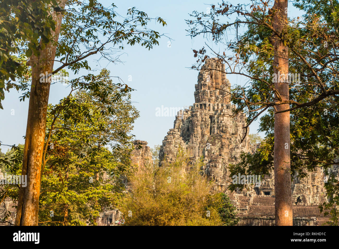 Ruins, temples and statues at sunrise depict Khmer Culture at Ta Prohm ...