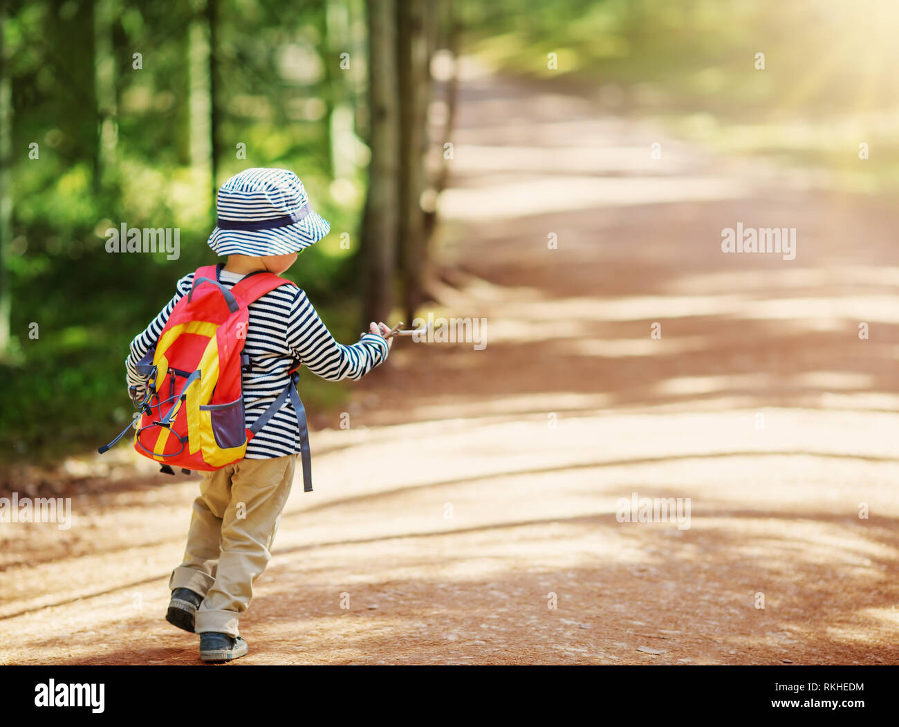 boy going camping with backpack in nature Stock Photo - Alamy