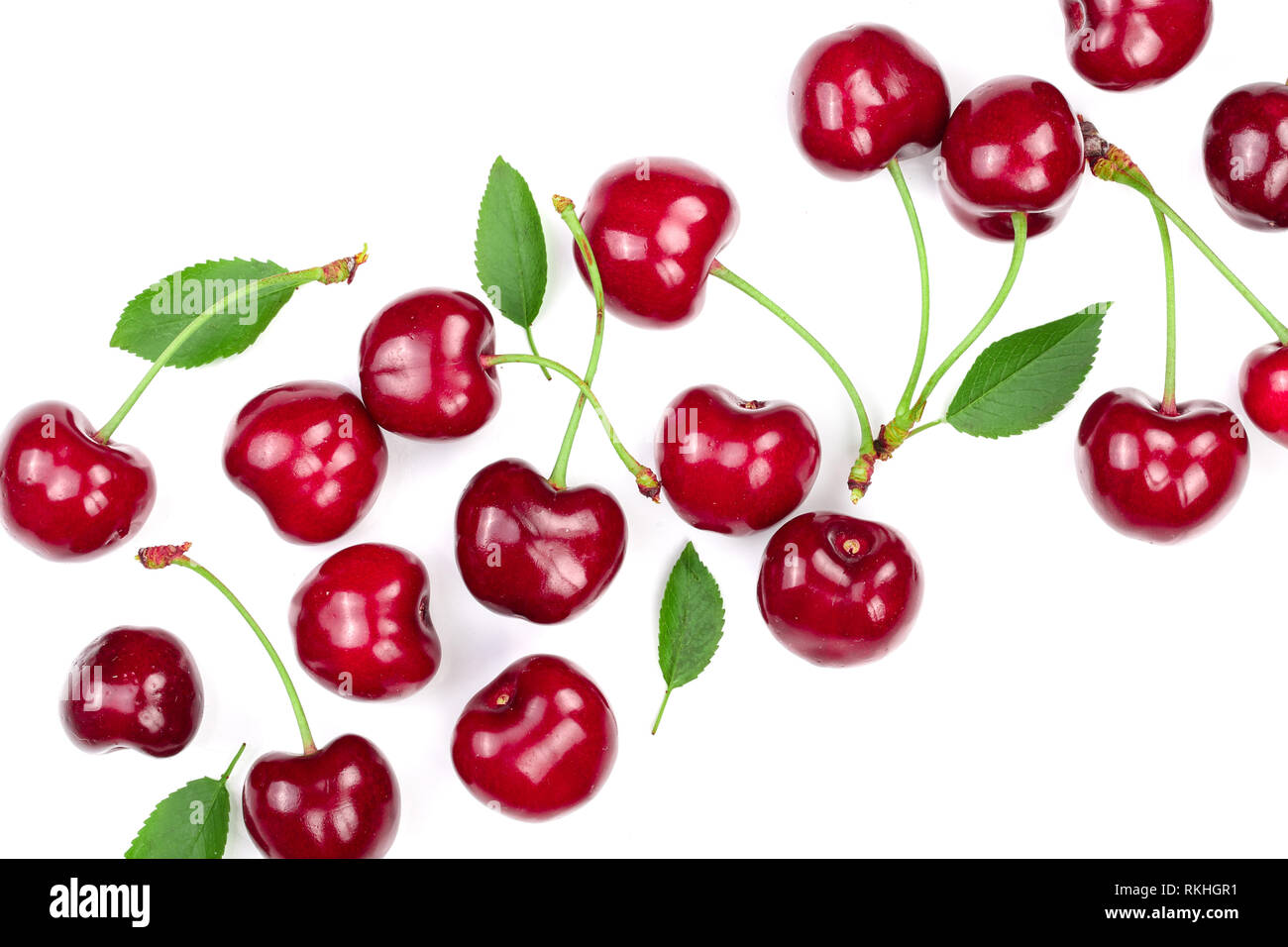 Sweet red cherries isolated on white background with copy space for ...