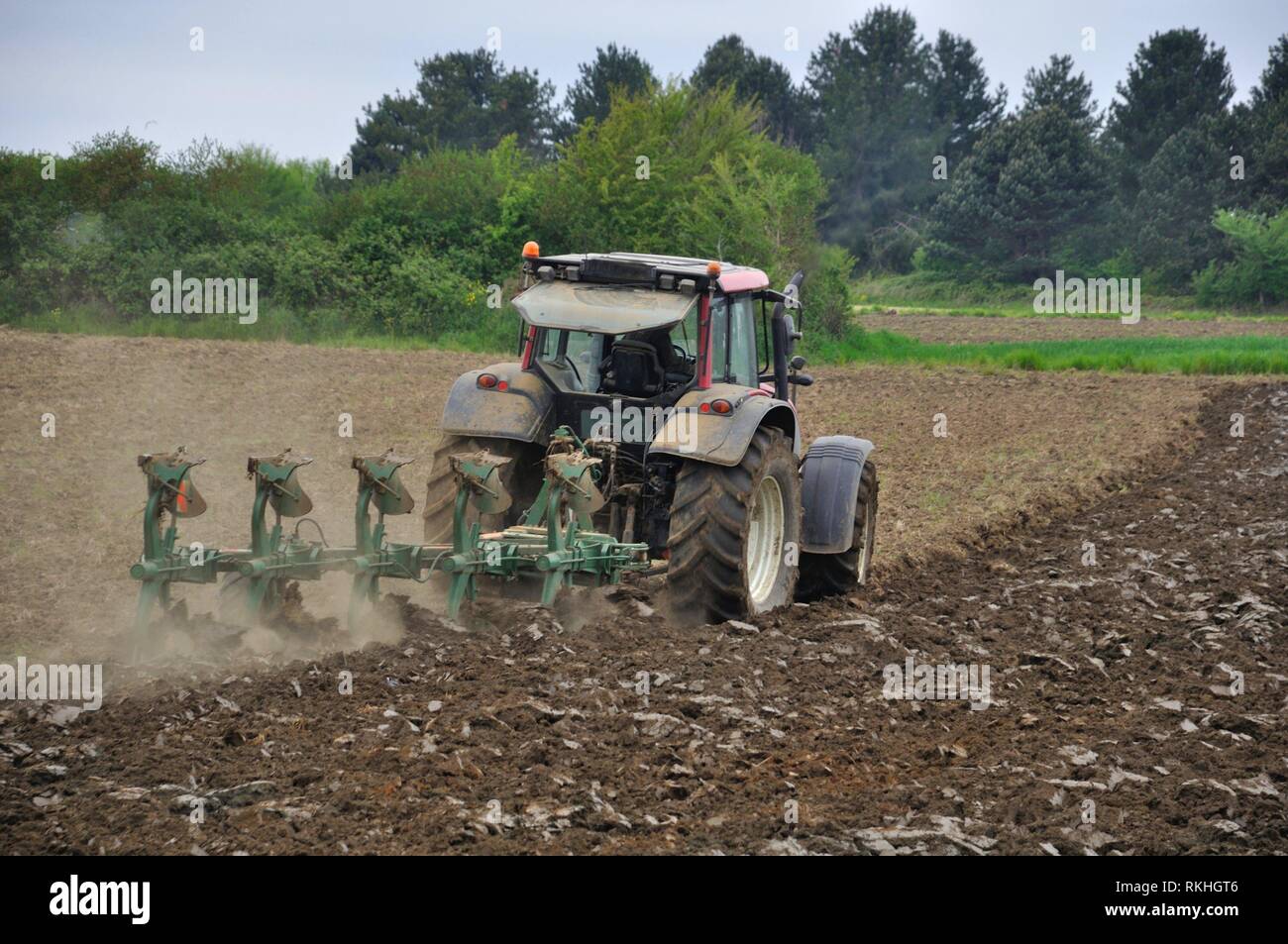 Tractor ploughing spring hi-res stock photography and images - Alamy