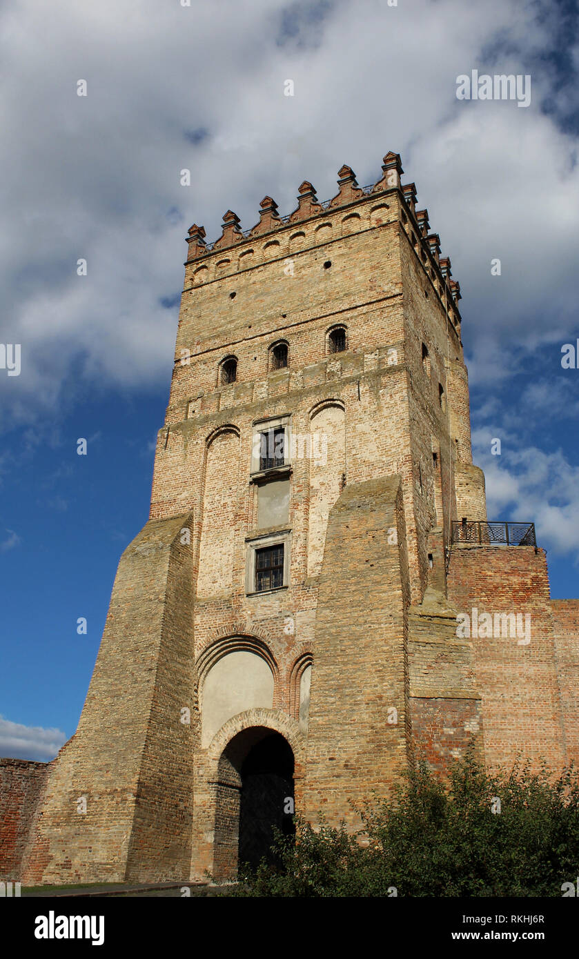 The main gate to the medieval fortress in tower on sky background Stock ...