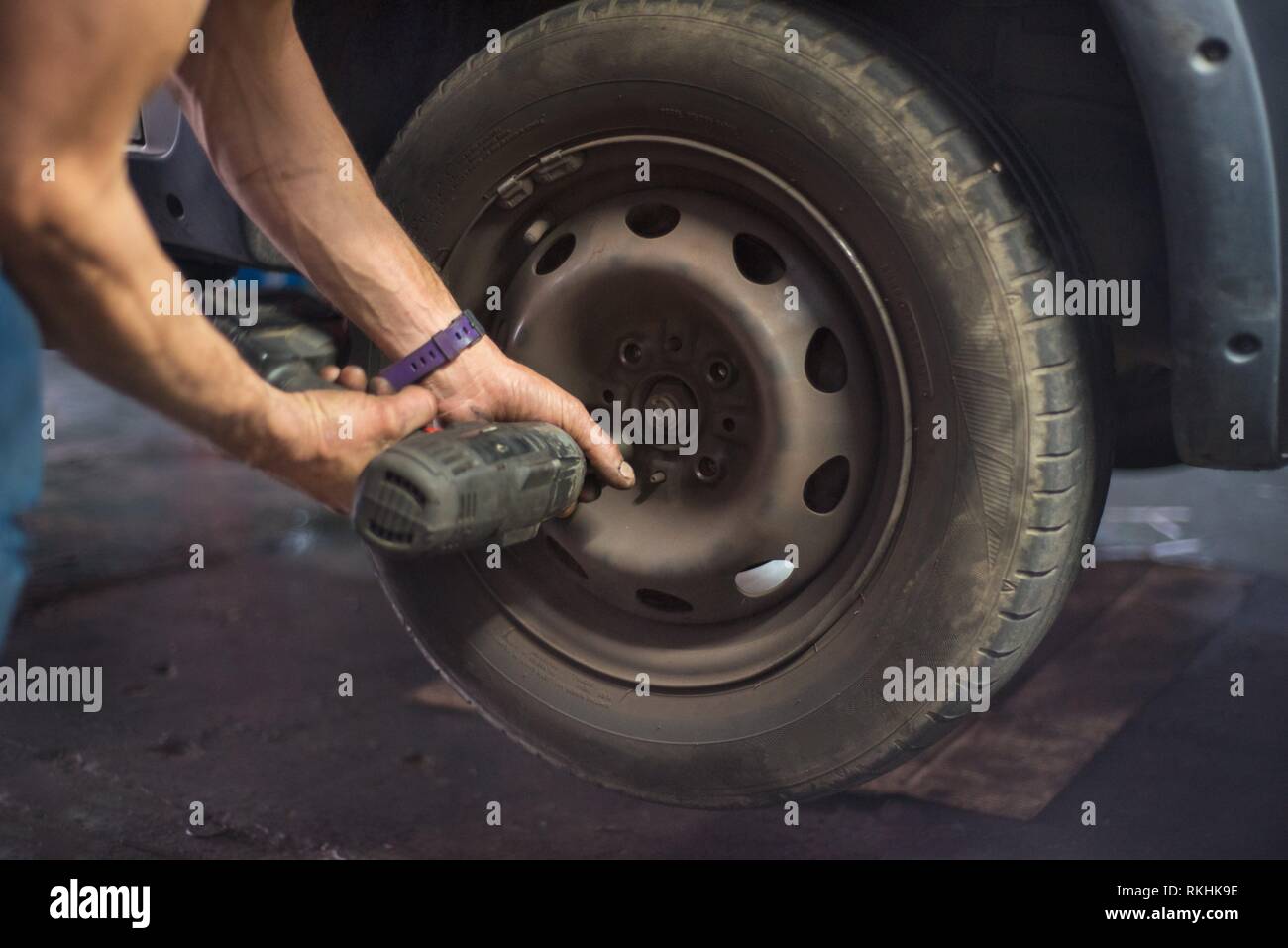 Man Changing Wheel High Resolution Stock Photography and Images - Alamy