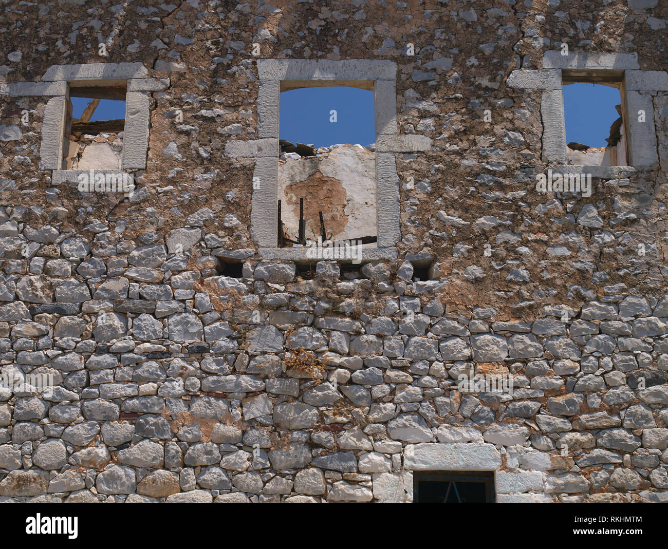 Old stone tower housed in traditional medieval village in Mani, Greece ...