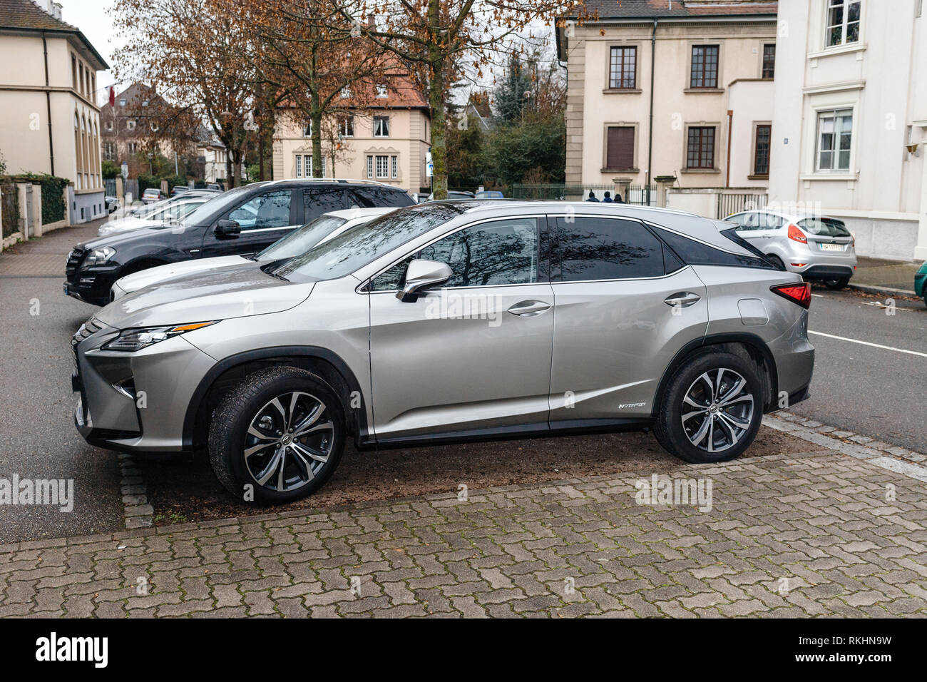 Paris, France - Jan 1, 2018: Side view of LEXUS RX 450h luxury silve ...