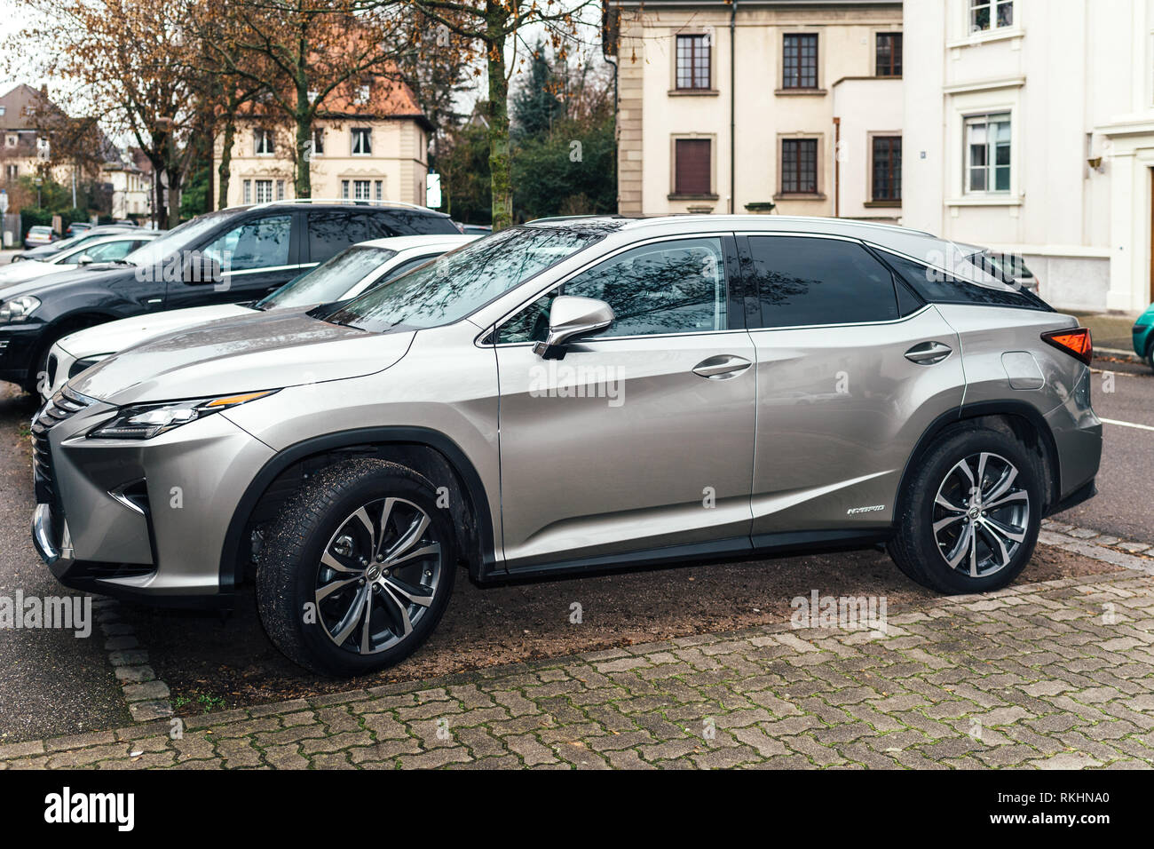 Paris, France - Jan 1, 2018: Side view of LEXUS RX 450h luxury silve ...