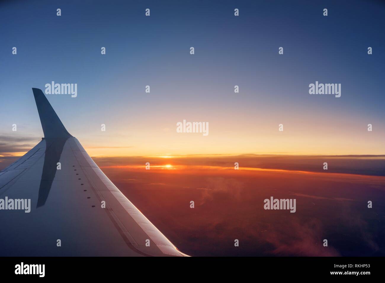 Aircraft wing at sunset hi-res stock photography and images - Alamy