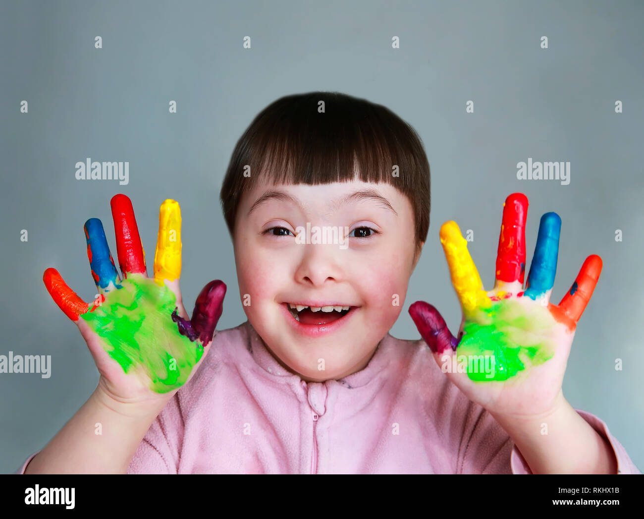 Cute little kid with painted hands hi-res stock photography and images ...