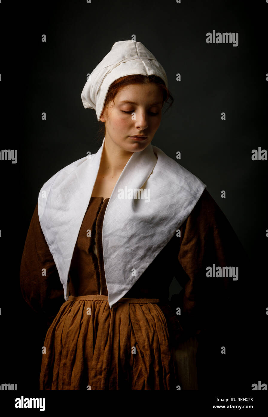 Medieval maid posing in studio Stock Photo - Alamy