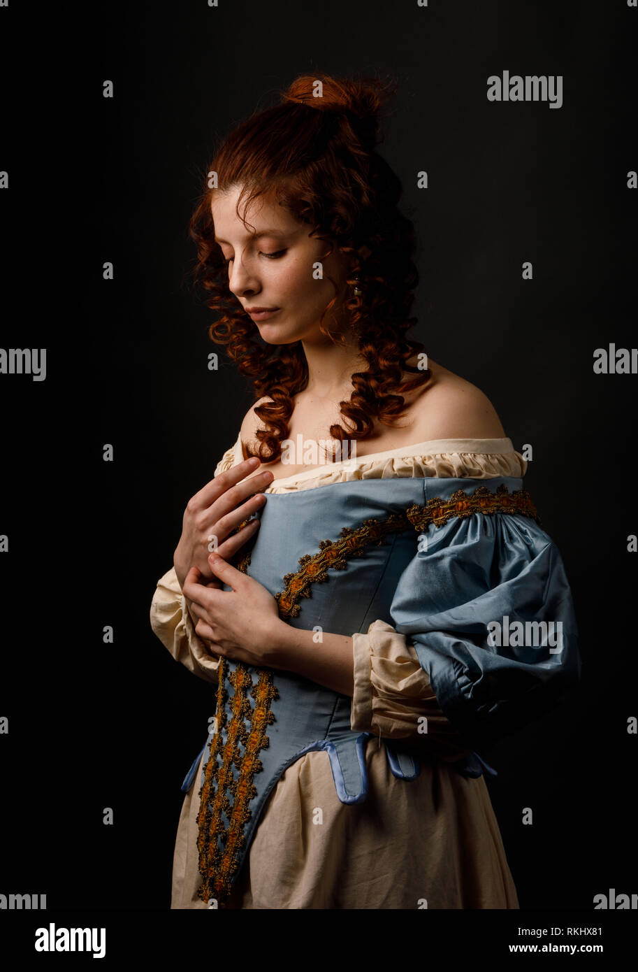 Beautiful Woman in medieval clothing Stock Photo - Alamy