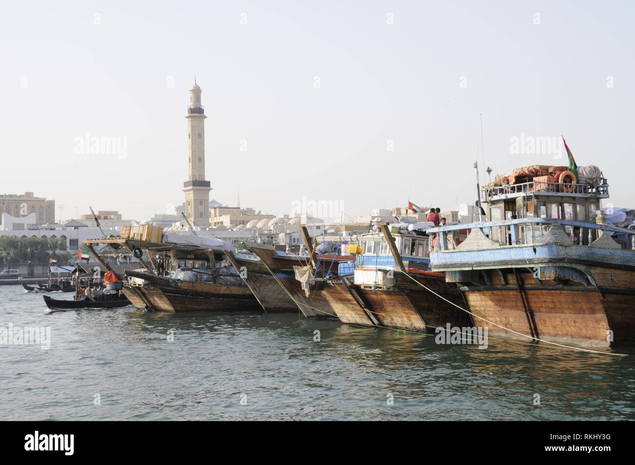 A fleet of ocean going Dhows (Arab boat) moored on the quayside of the ...