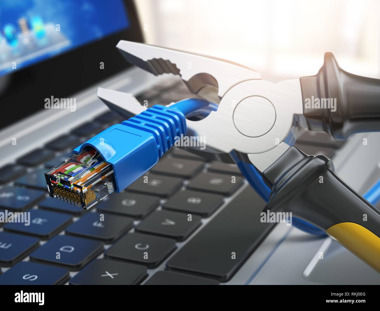 Pliers Cutting Lan Network Computer Cable Over Laptop Keyboard