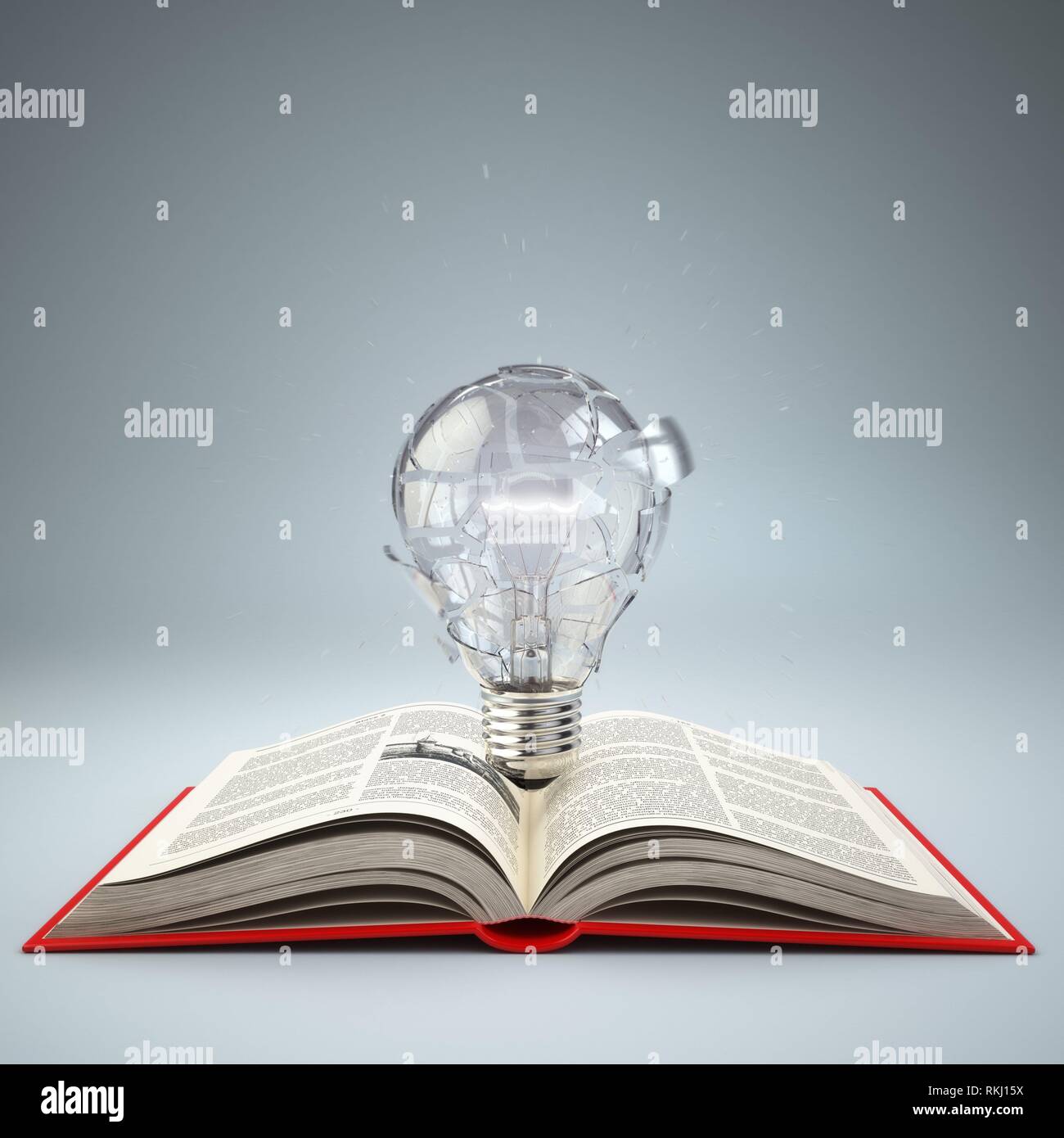 Light bulb over open book hi-res stock photography and images - Alamy
