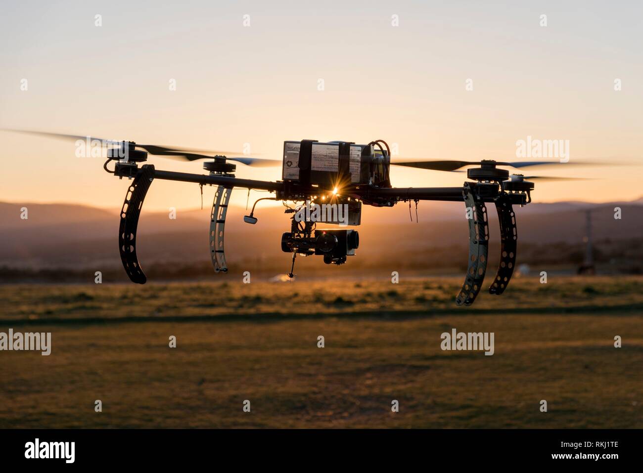 Long endurance professional drone prototype Flying at dusk Stock Photo ...