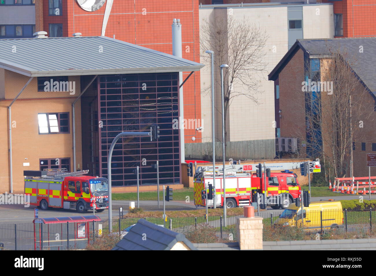 Fire engines leaving Kirkstall Road Fire Station in Leeds Stock Photo ...