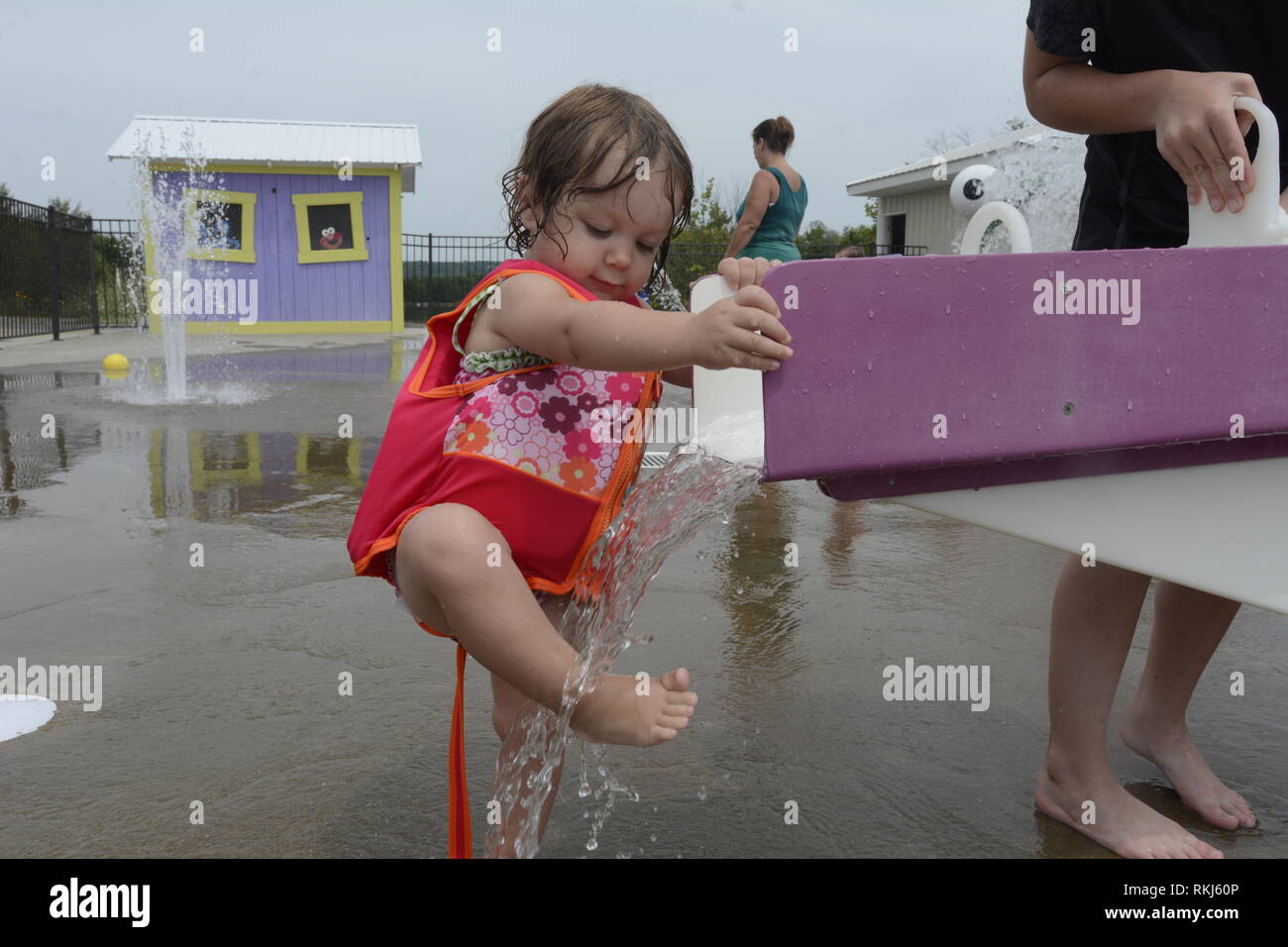 Girl washing feet hi-res stock photography and images - Alamy