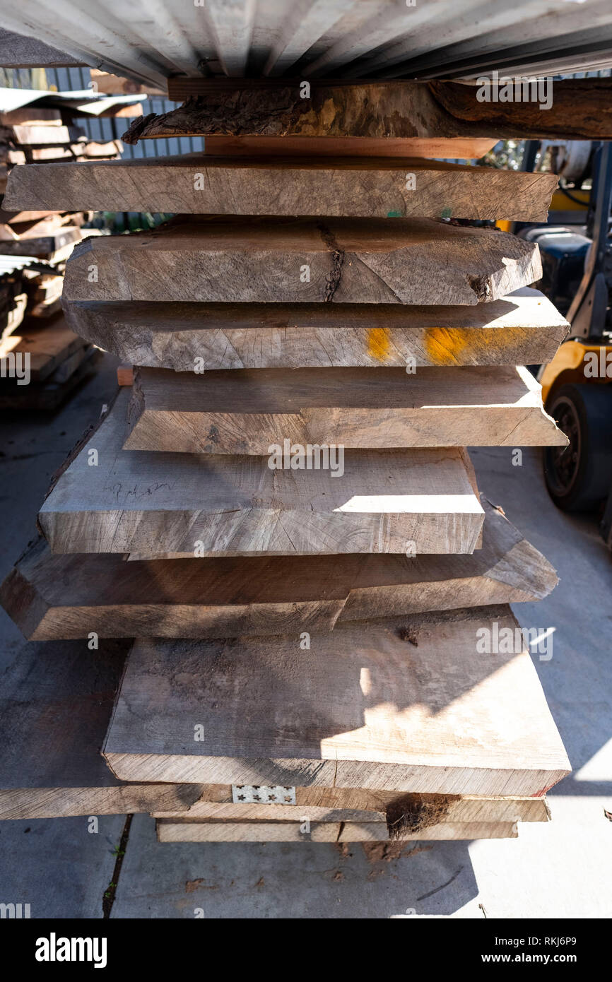 Timber slabs waiting to be made into table tops and benches Stock Photo ...