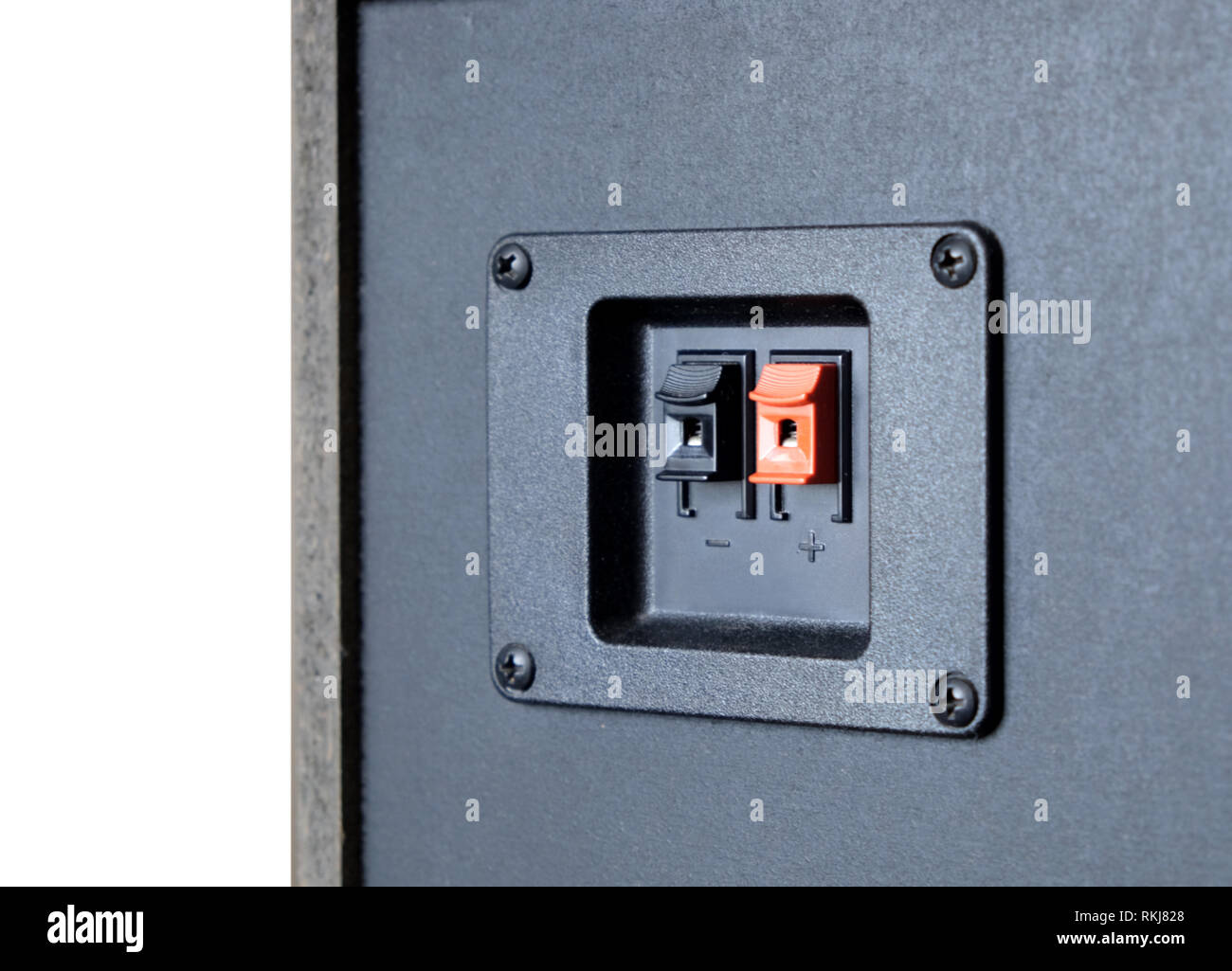 Red and black twisted wire connected to cable connection socket on rear ...