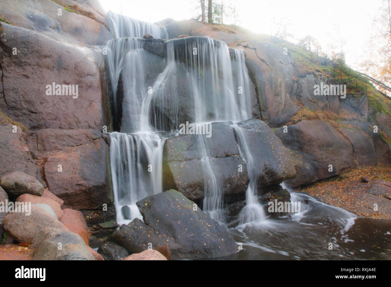 Waterfall cascading over rocks in Sapokka landscaping park Kotka ...