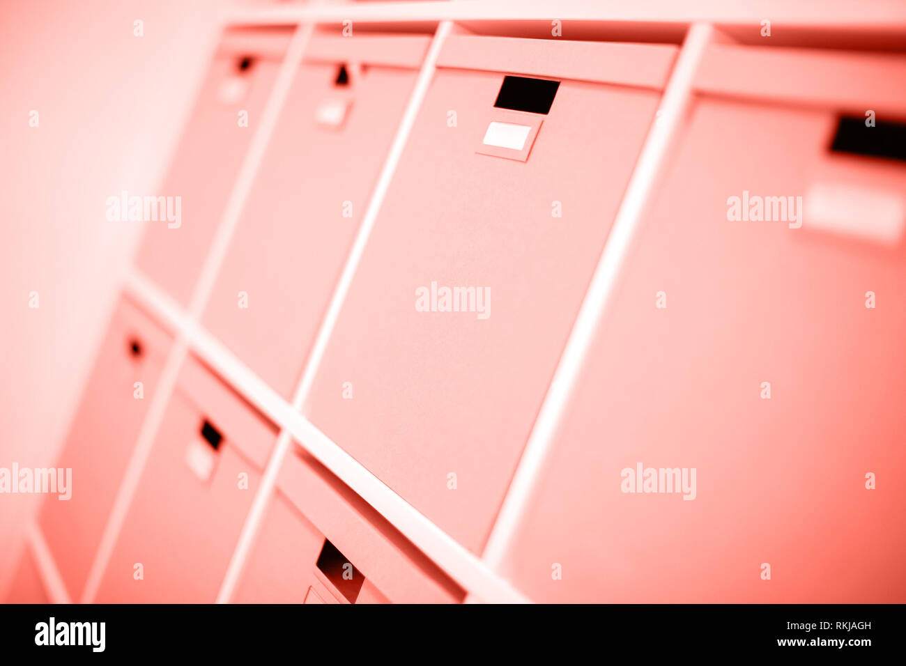 many coral boxes. shelves for storage Stock Photo - Alamy