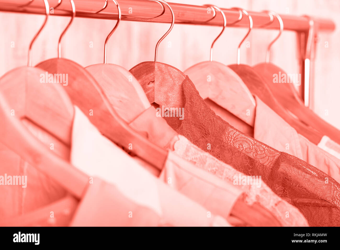 Blouses on a rack hi-res stock photography and images - Alamy