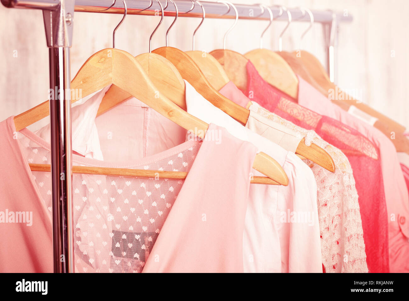 Blouses on a rack hi-res stock photography and images - Alamy