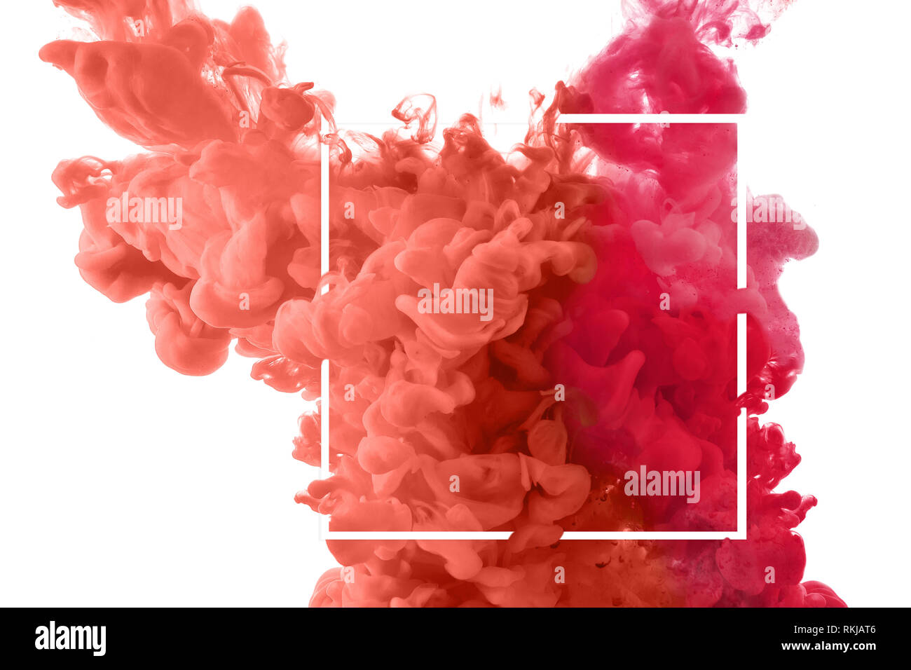 coral splashes of ink in water isolated on white Stock Photo - Alamy