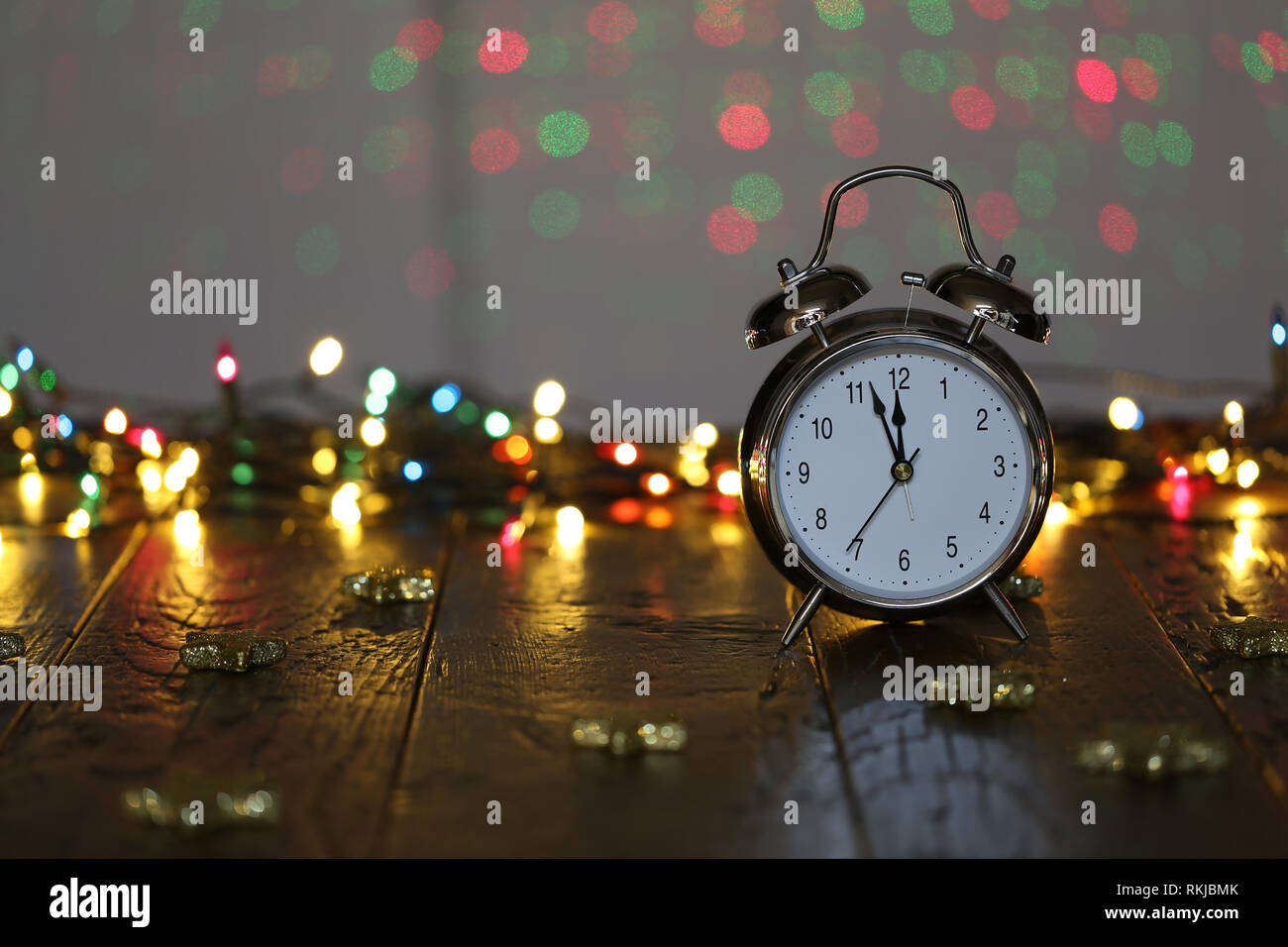Alarm clock / A few minutes left before the New Year Stock Photo - Alamy