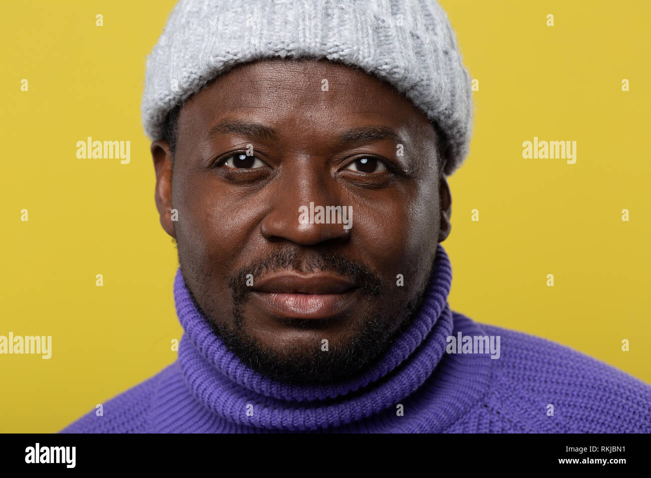 Handsome international man posing straight on camera Stock Photo - Alamy