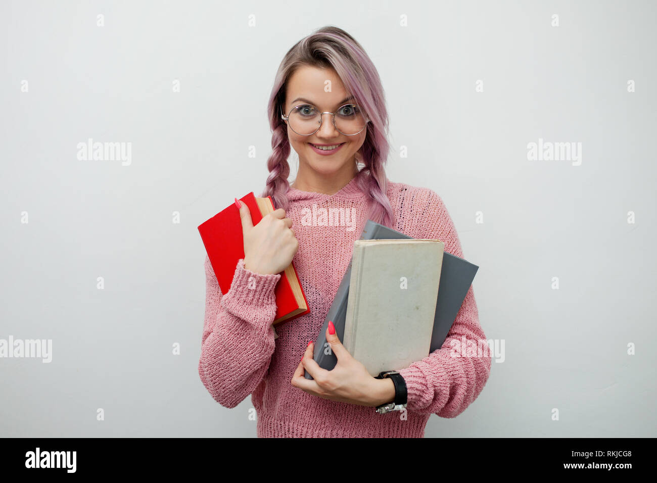 Student. Young woman with books. Nice girl is ready to learn, get ...