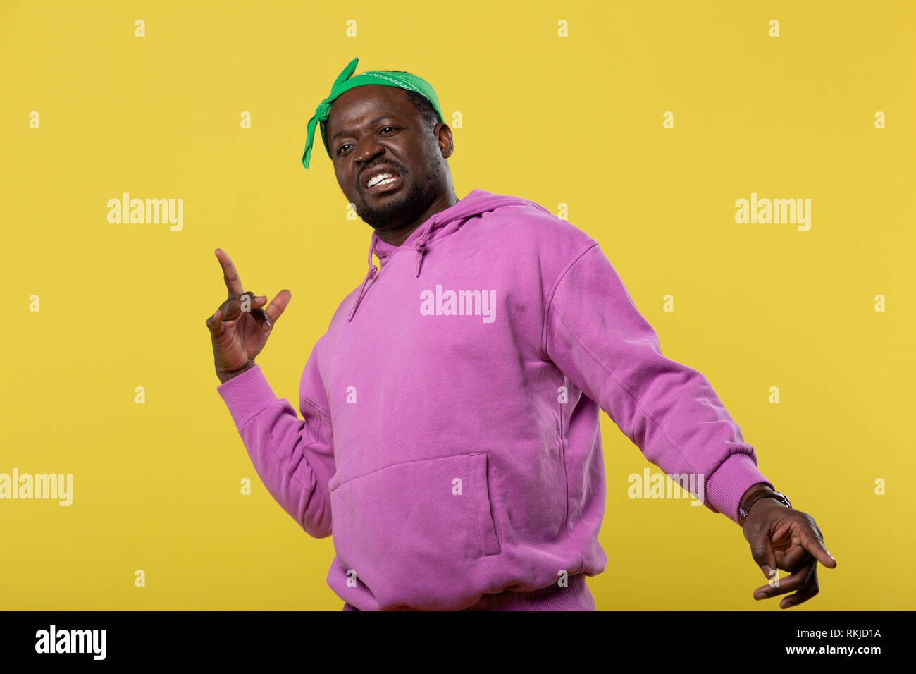 Emotional international man pointing straight at camera Stock Photo - Alamy