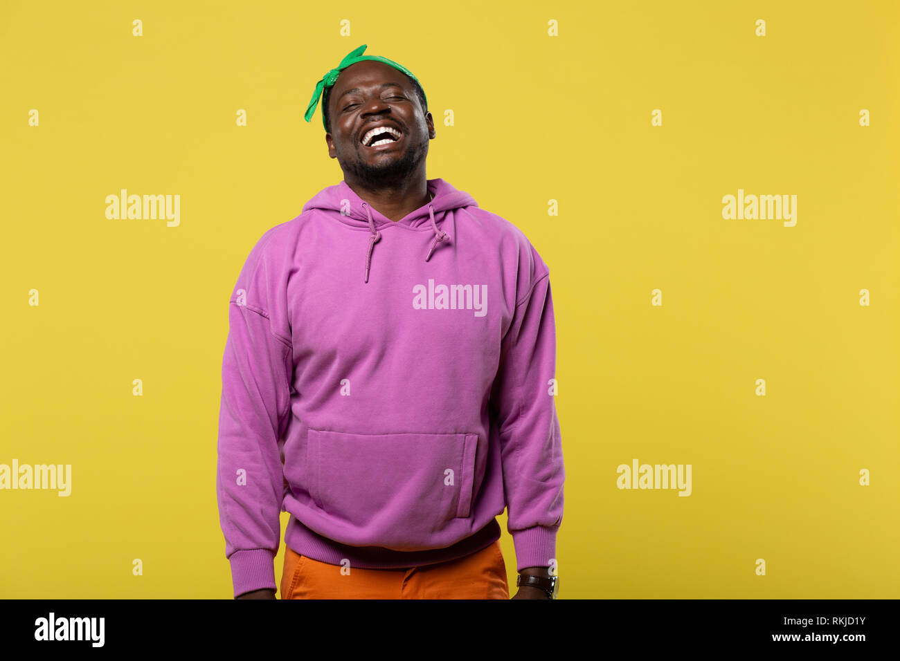 Positive delighted model laughing at funny joke Stock Photo - Alamy