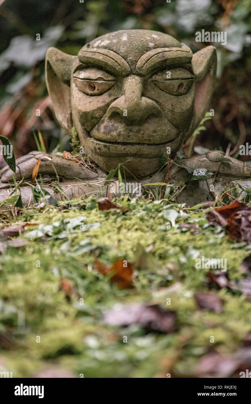 Gravestone head stone of Gargoyle Stock Photo - Alamy