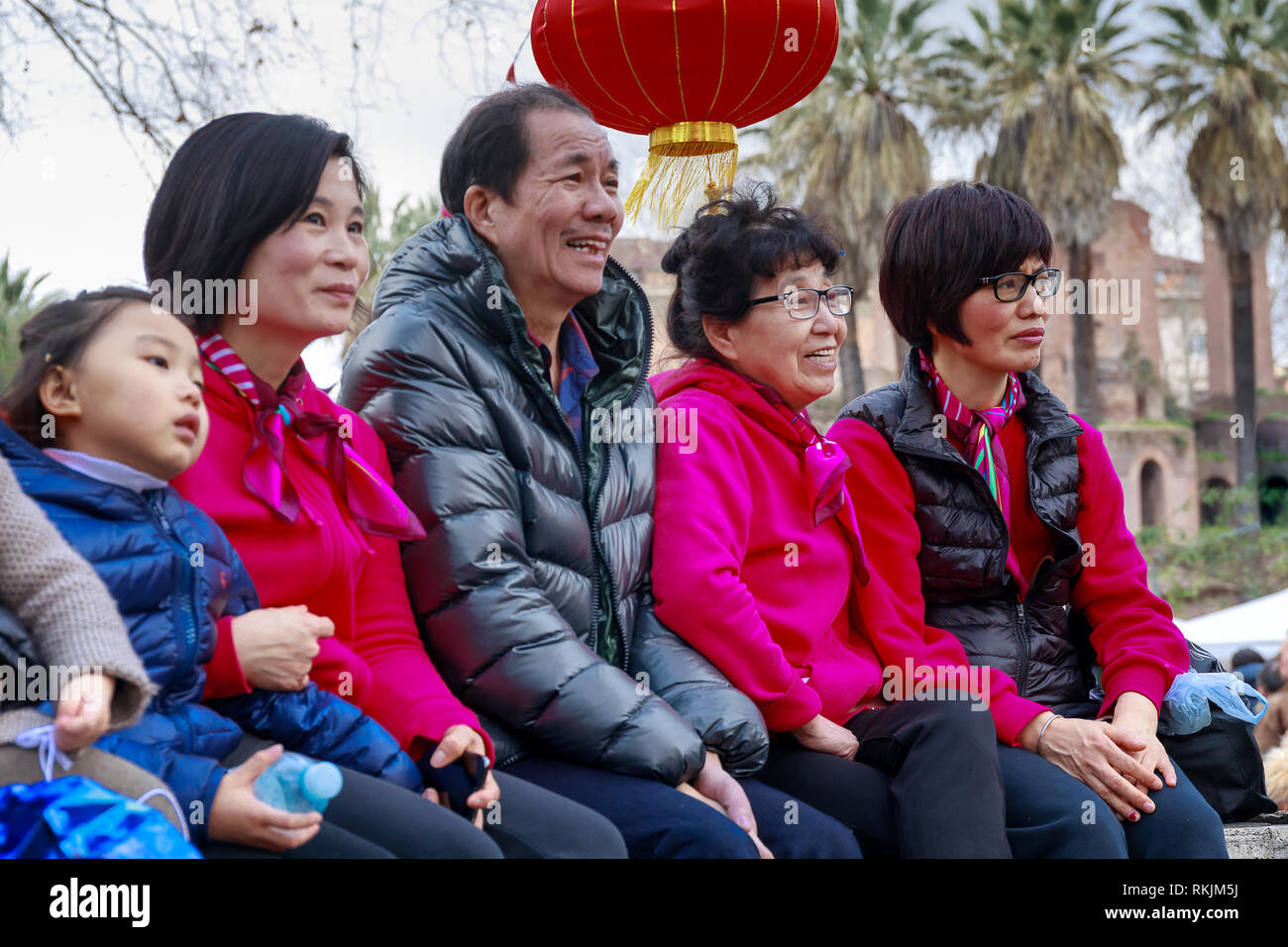 Rome, Italy - 10 February 2019: A typical Chinese family follows the ...