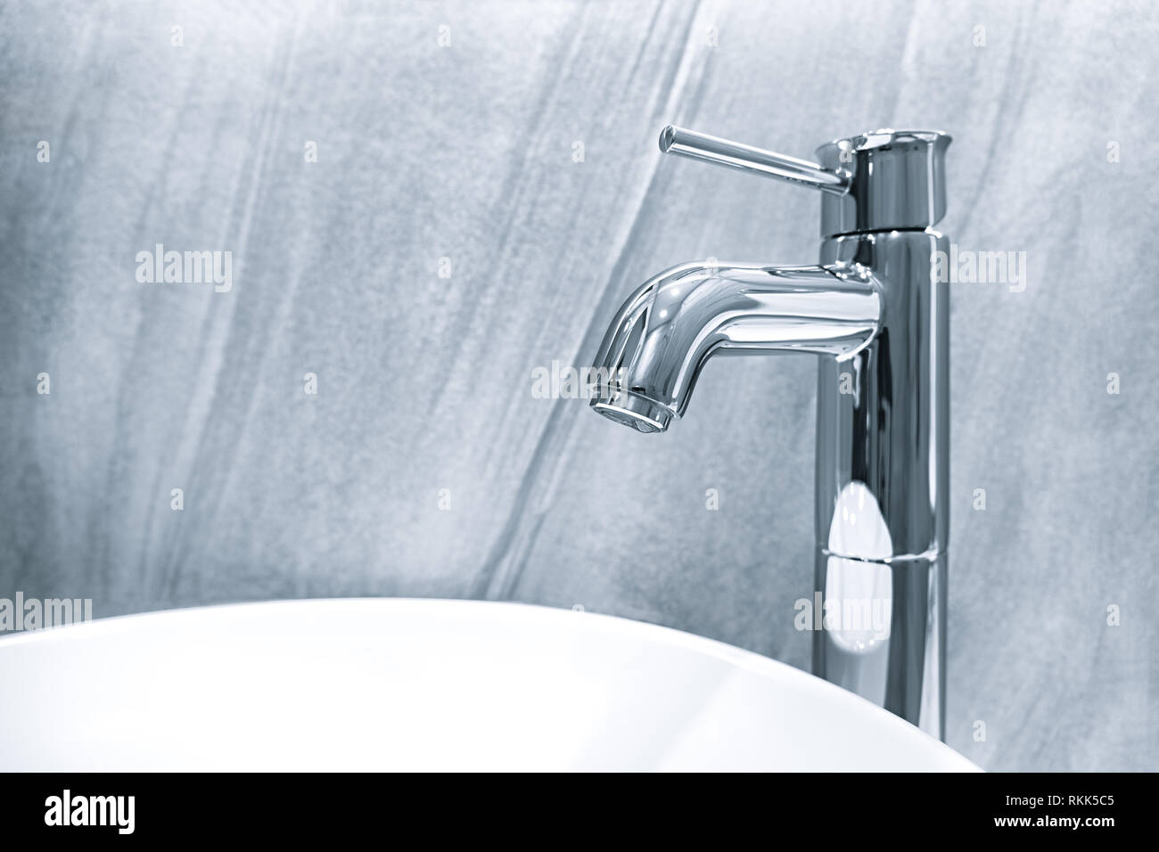 Luxury big faucet mixer and white sink in a beautiful bathroom Stock ...