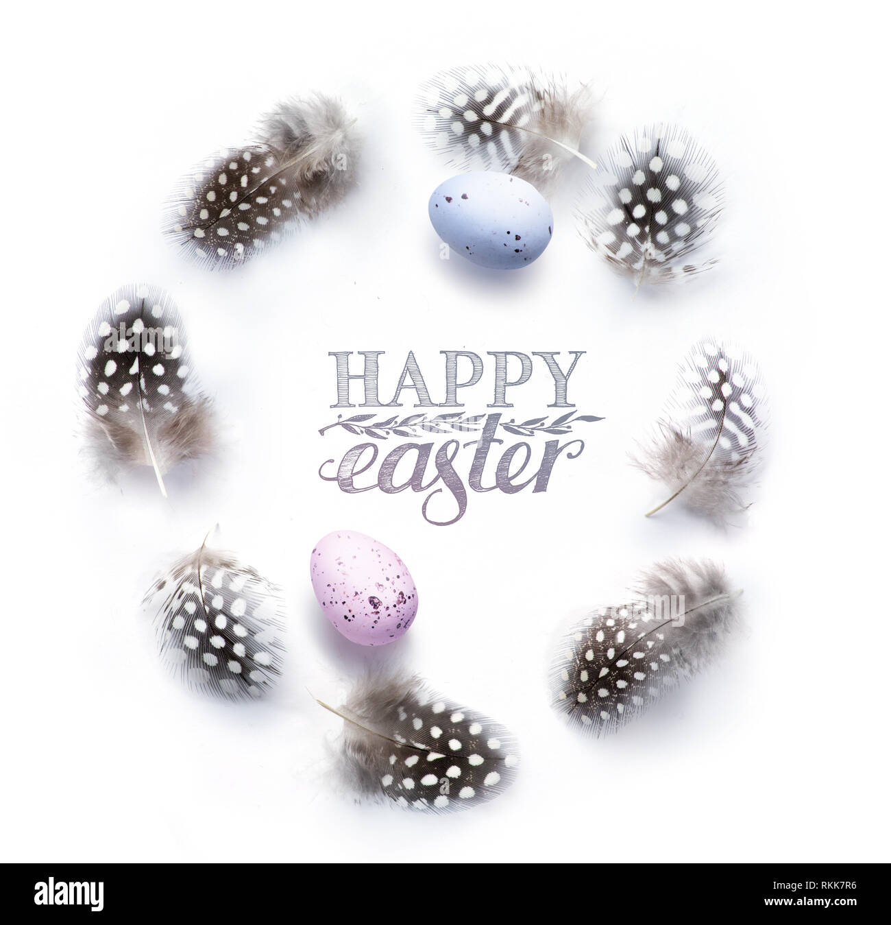 Painted Eggs and birds feather - Easter Background Stock Photo - Alamy