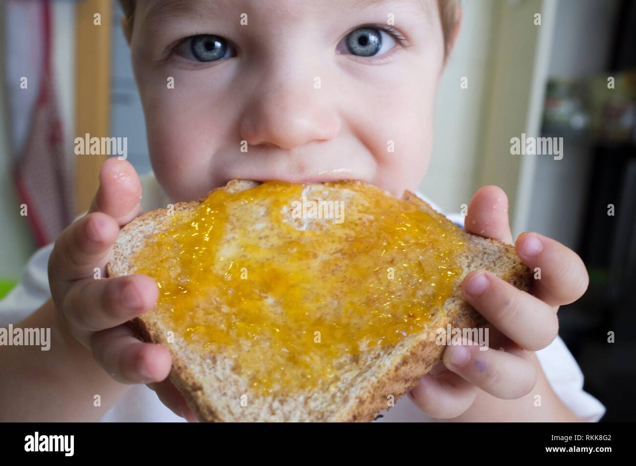 Boy with peach hi-res stock photography and images - Alamy