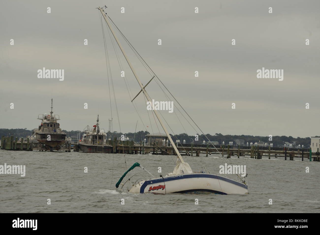 Sailing Ship "Sanity" Tilting on a Sand Bar Near Harbour Pilot House ...