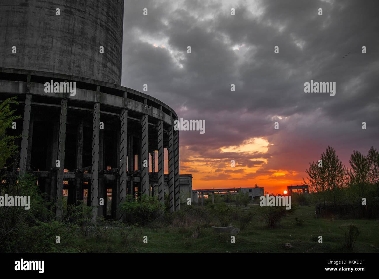Industrial building and sunset scene Stock Photo - Alamy