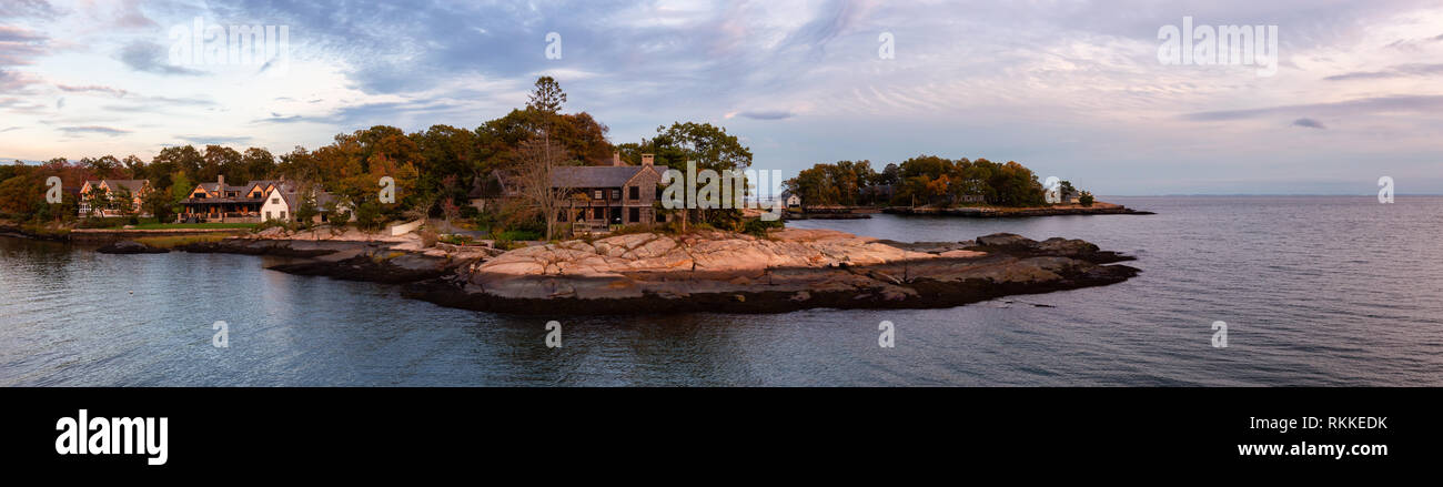 Panoramic seascape view of beautiful homes on a rocky Atlantic Coast ...