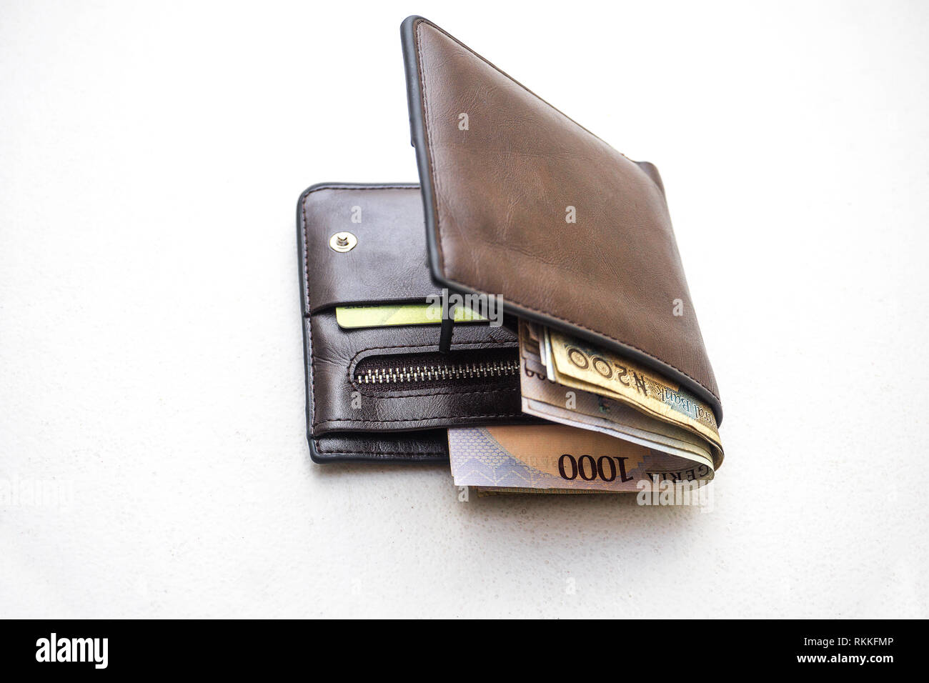 Nigerian Naira - A wallet with naira notes of different denominations ...