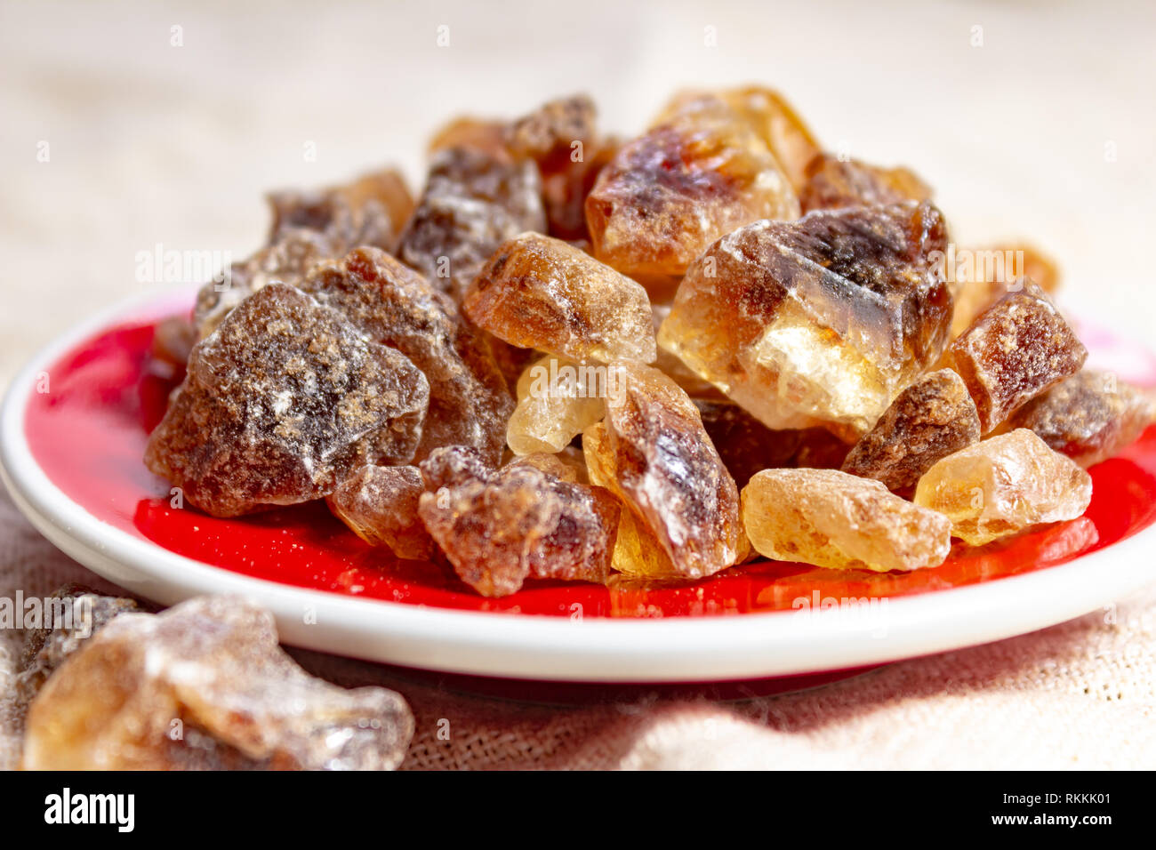 Crystals of candy sugar, traditional brown rock sugar originally from ...