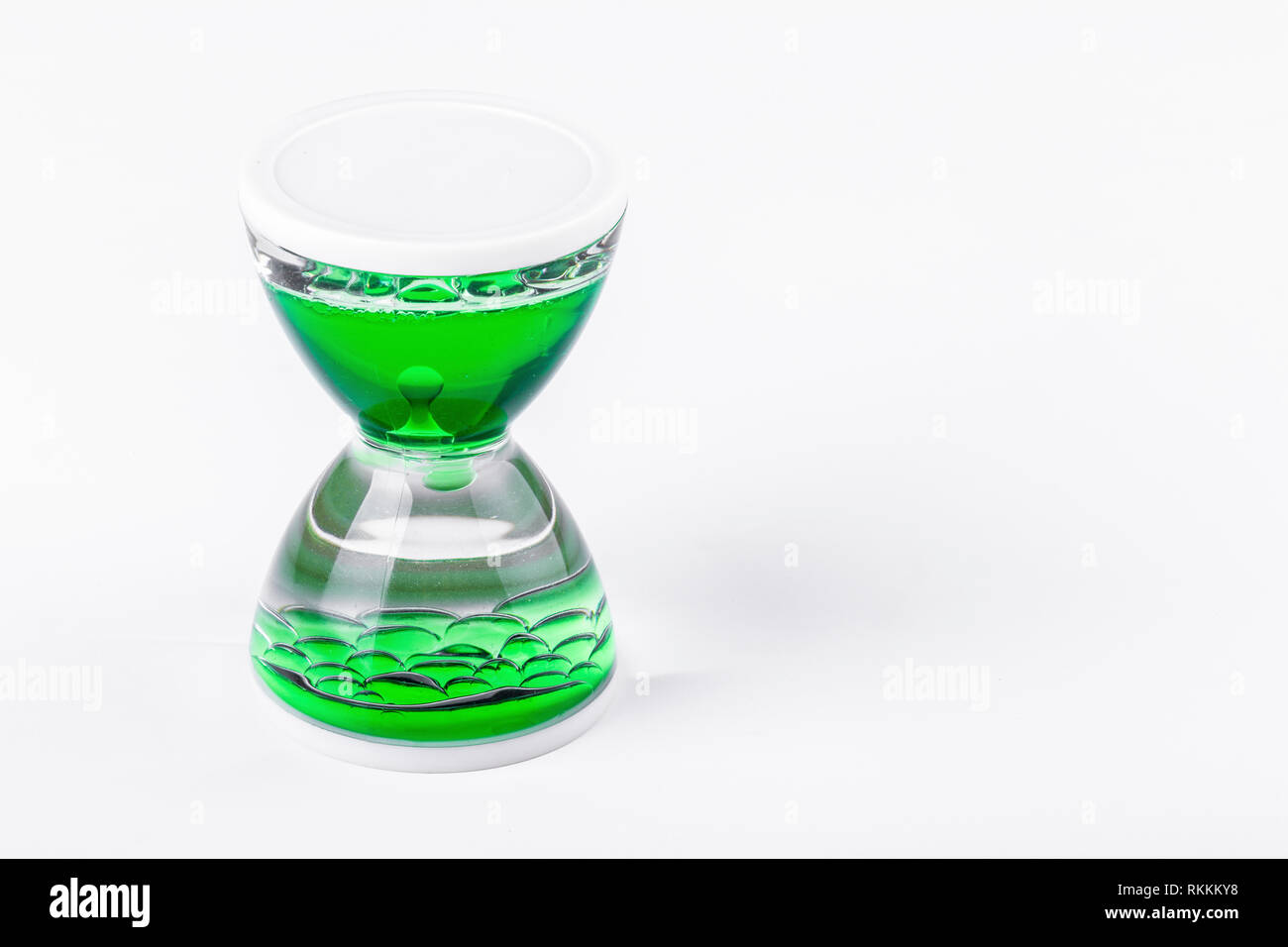 liquid hourglass made of water and oil, on white background Stock Photo ...