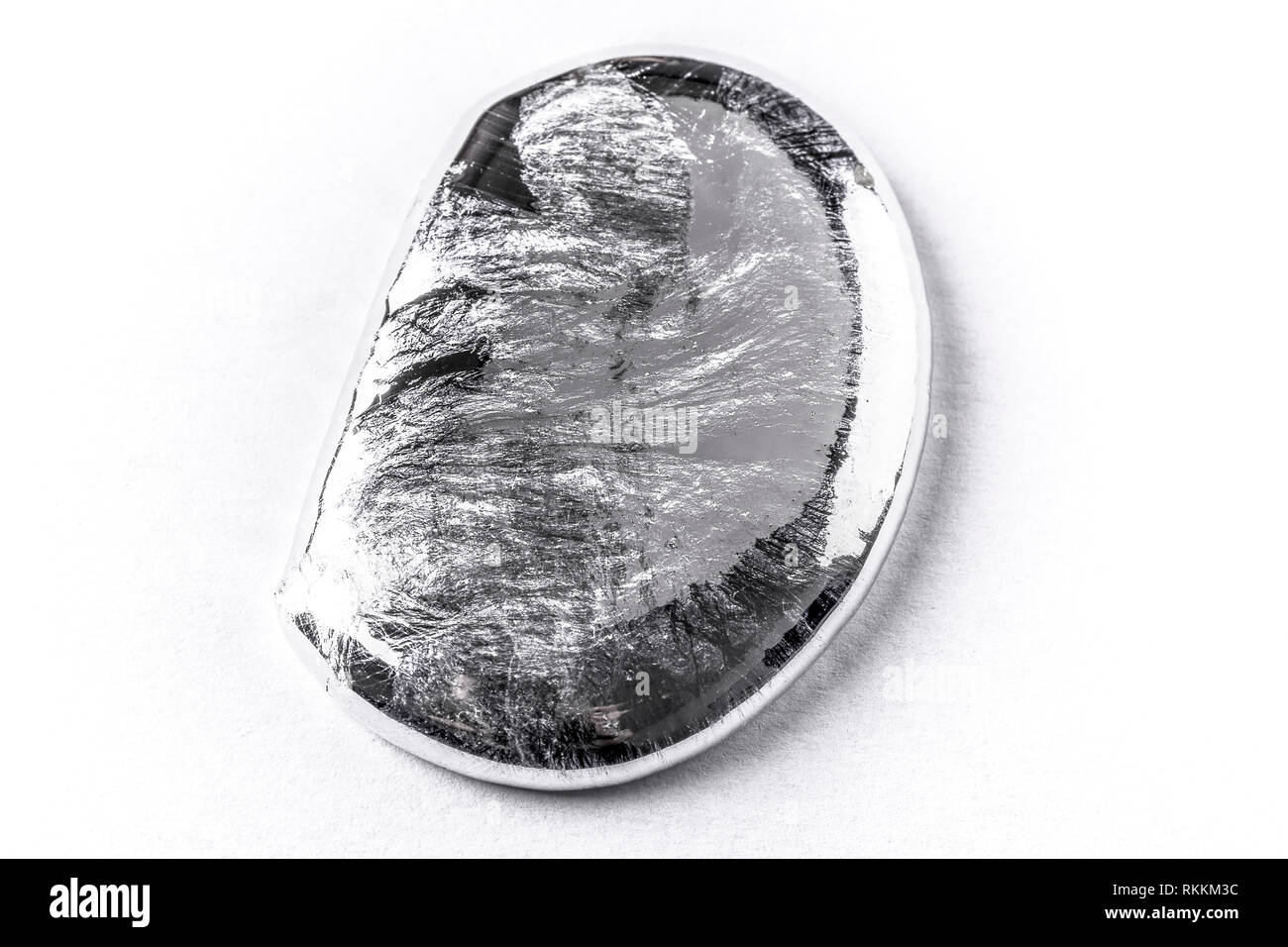 Liquid metal drop on white background Stock Photo - Alamy