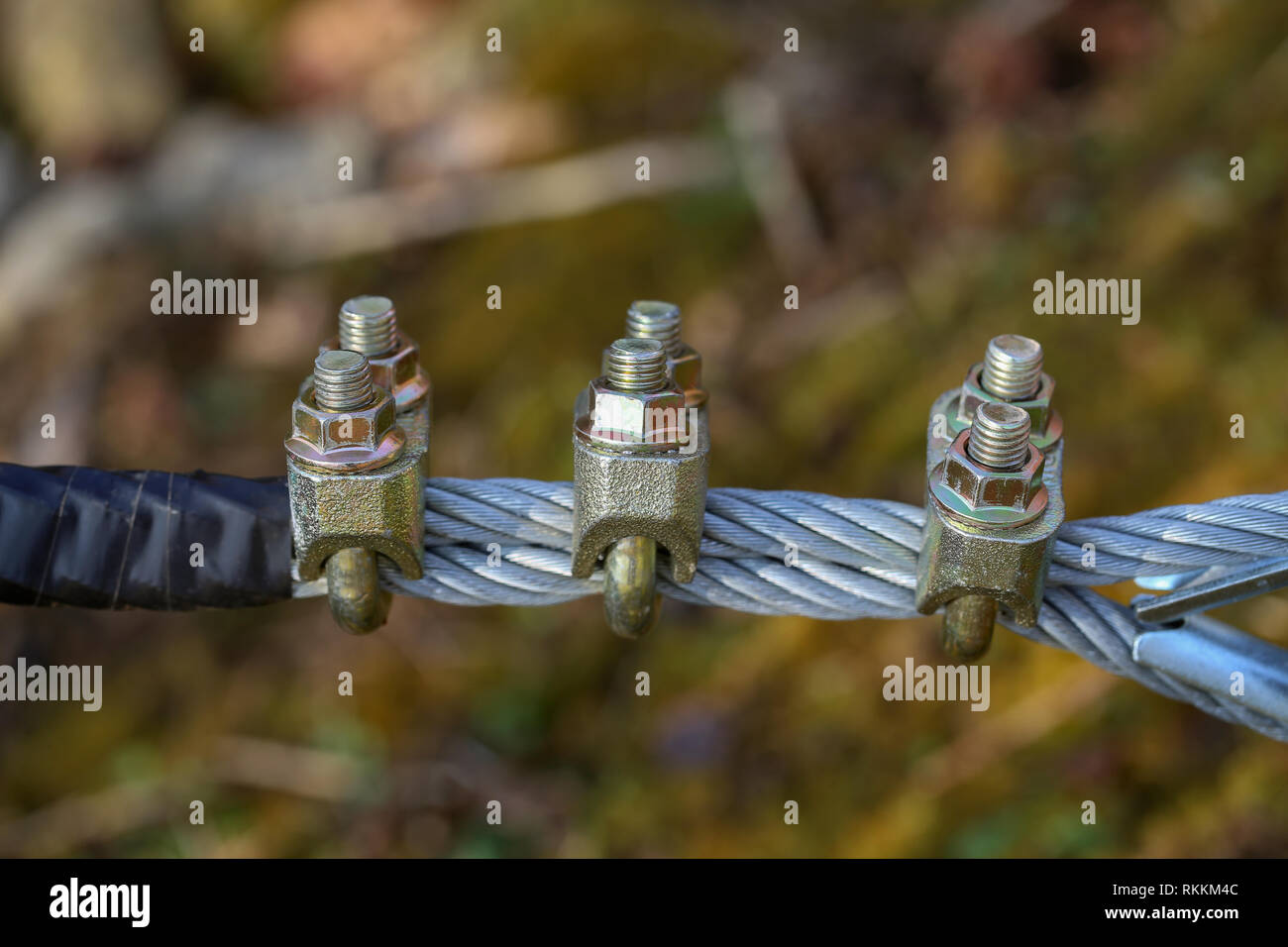 Bolts and nuts / Cable with bolts and nuts Stock Photo - Alamy