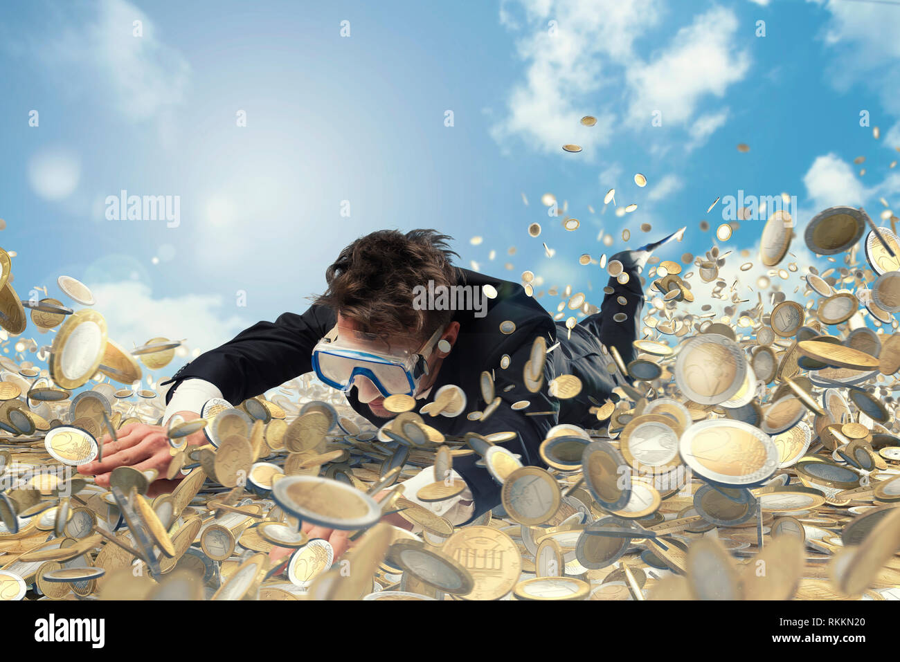 Businessman swims in a pool of money Stock Photo - Alamy