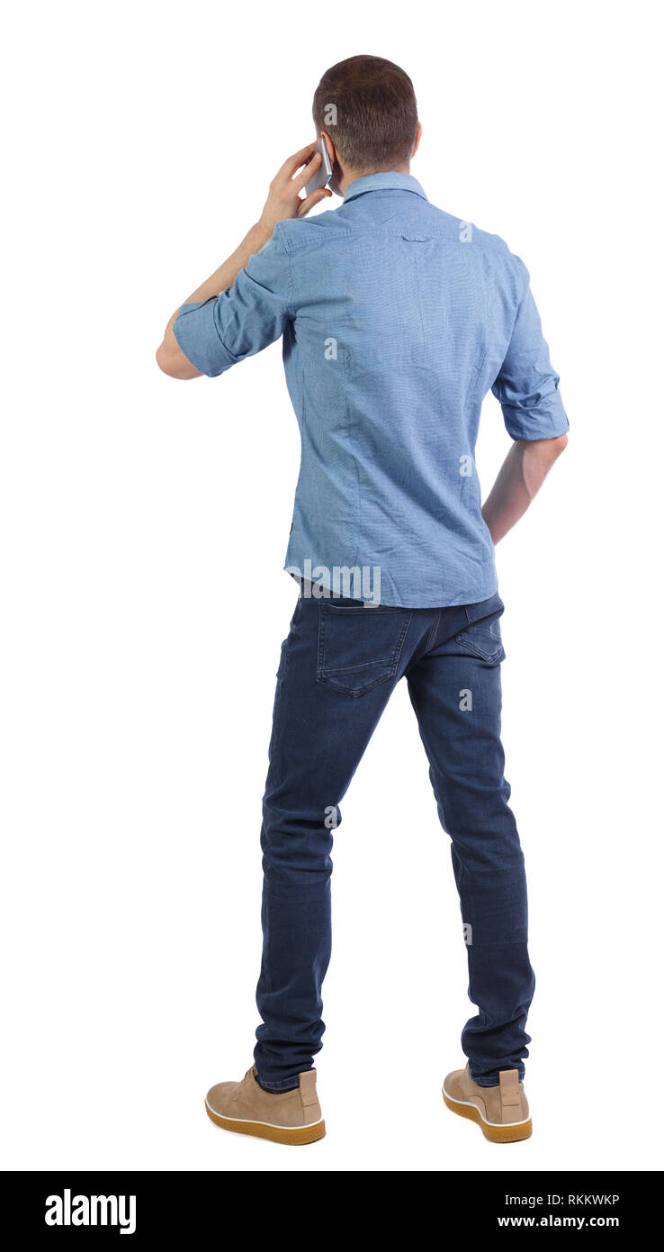 back view of a man talking on the phone. backside view of person. Rear ...