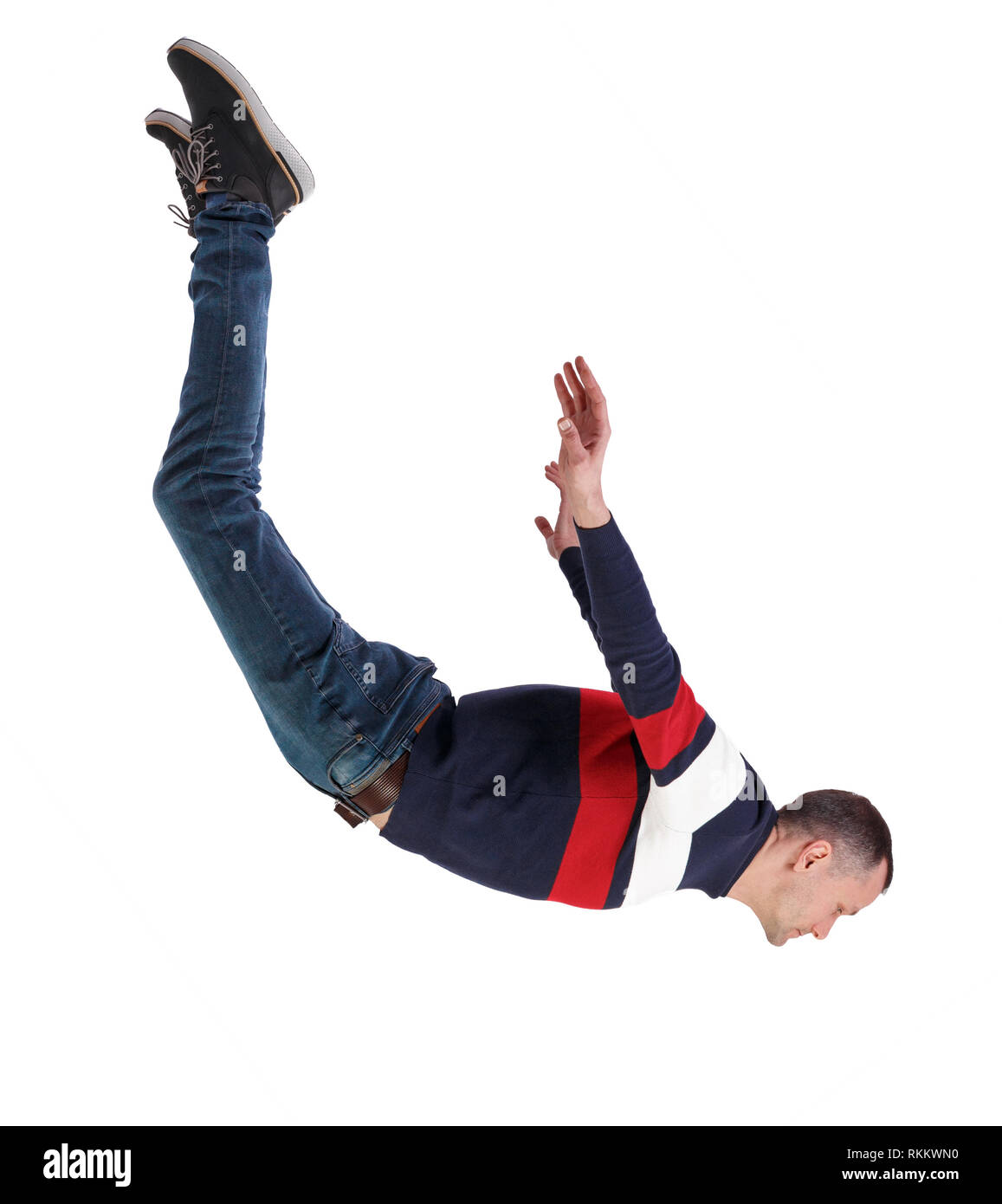 Side view of man in zero gravity or a fall. guy is flying, falling or ...