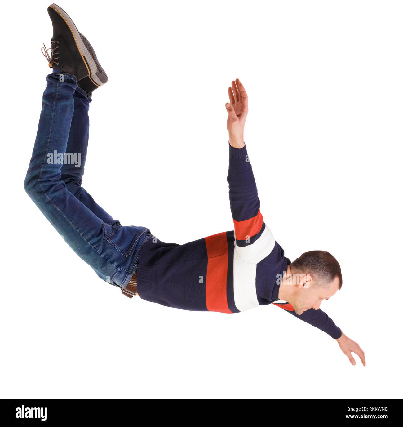 Side view of man in zero gravity or a fall. guy is flying, falling or ...
