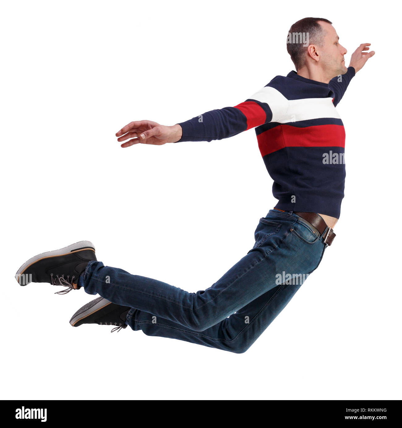 Side view of man in zero gravity or a fall. guy is flying, falling or ...