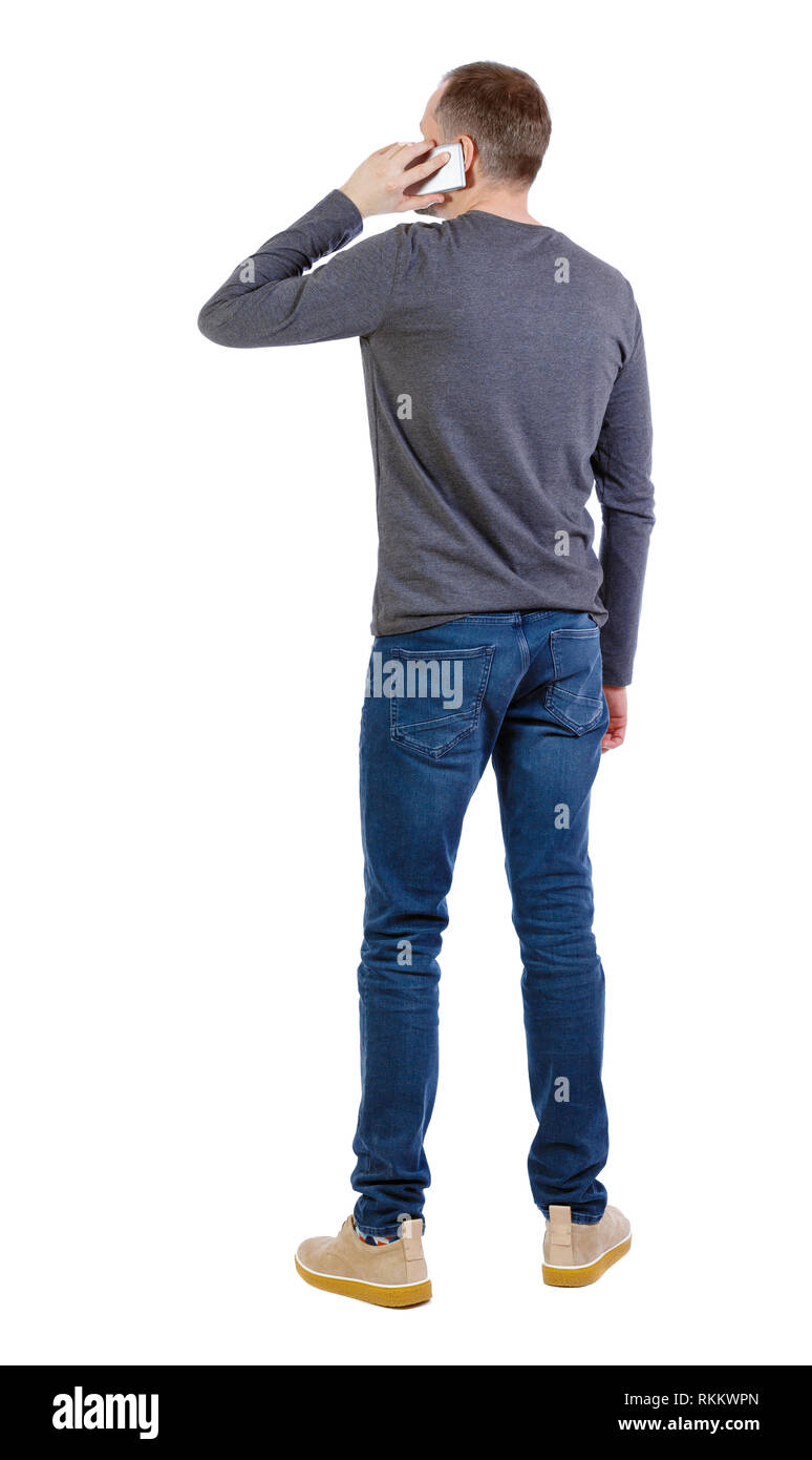 back view of a man talking on the phone. backside view of person. Rear ...